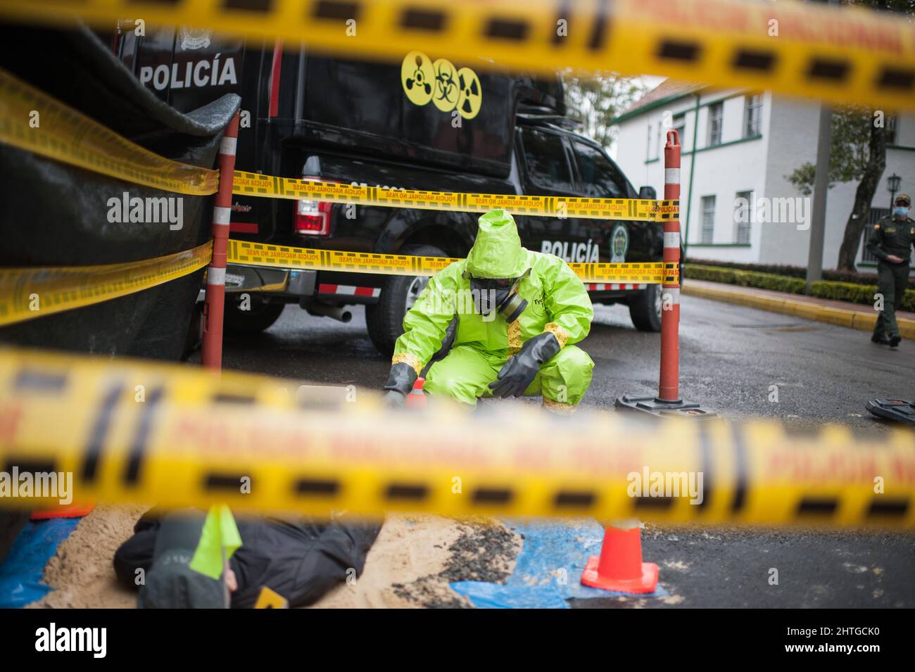 A member of Colombia's Anti-Terrorist Police demonstrates how ...