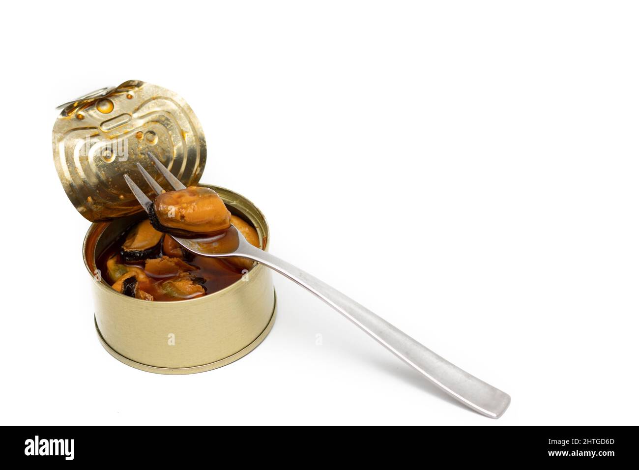 A can of preserves with mussels, isolated on white background. Food ...