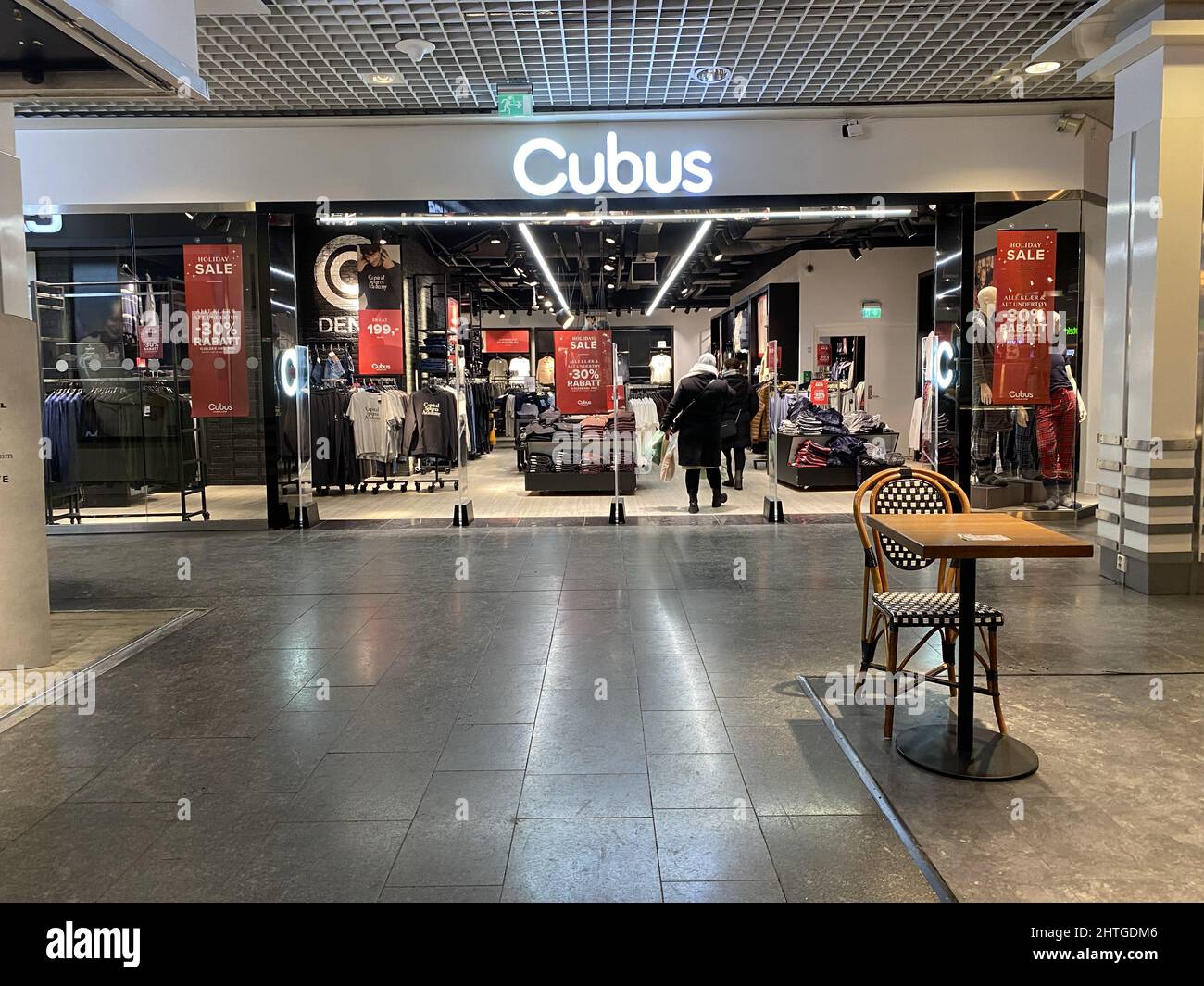 Entrance of the Cubus store with sale signs in Oslo City inside a ...