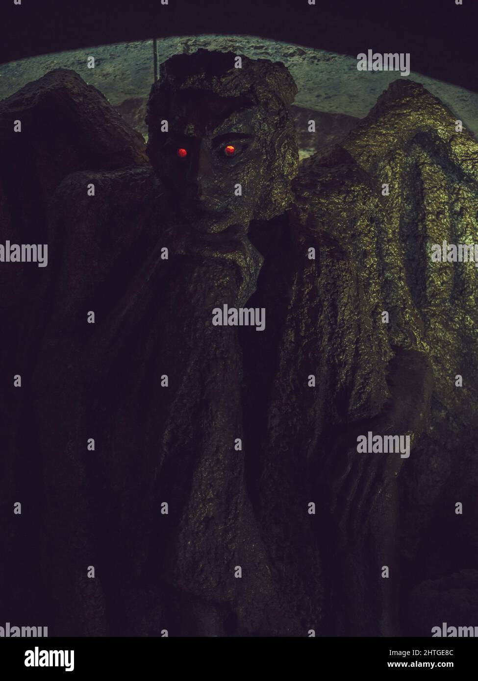 Russia, Kislovodsk 02.11.2021. A large statue of demon with glowing red ...