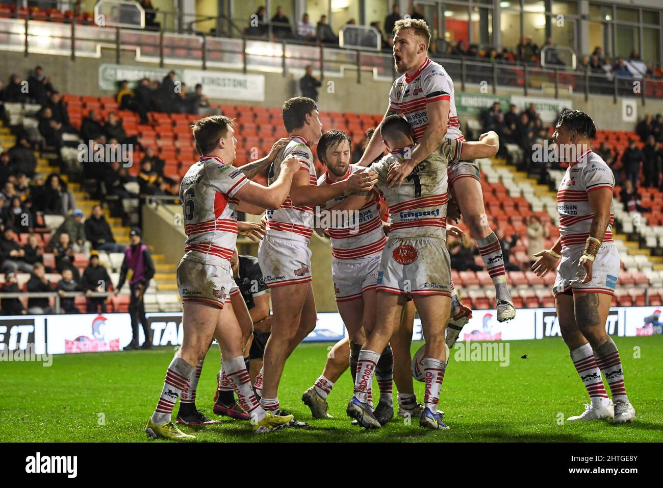 Sam Stone #12 of Leigh Centurions celebrates scoring a try to make it ...