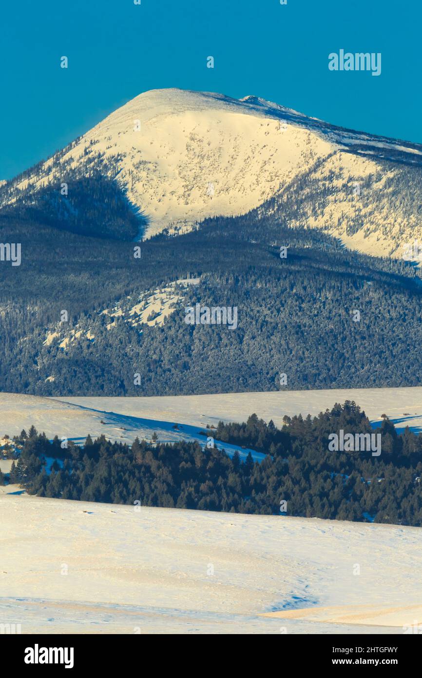 peak in the flint creek range in winter near garrison, montana Stock ...