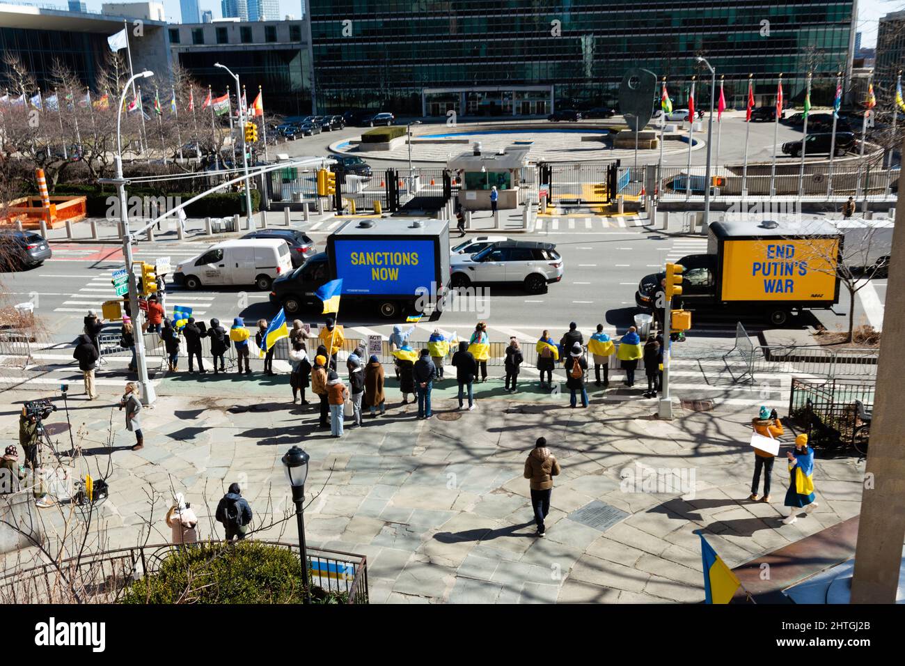 New York, NY, USA. 28th Feb, 2022. Pro-Ukrainian protesters face the ...
