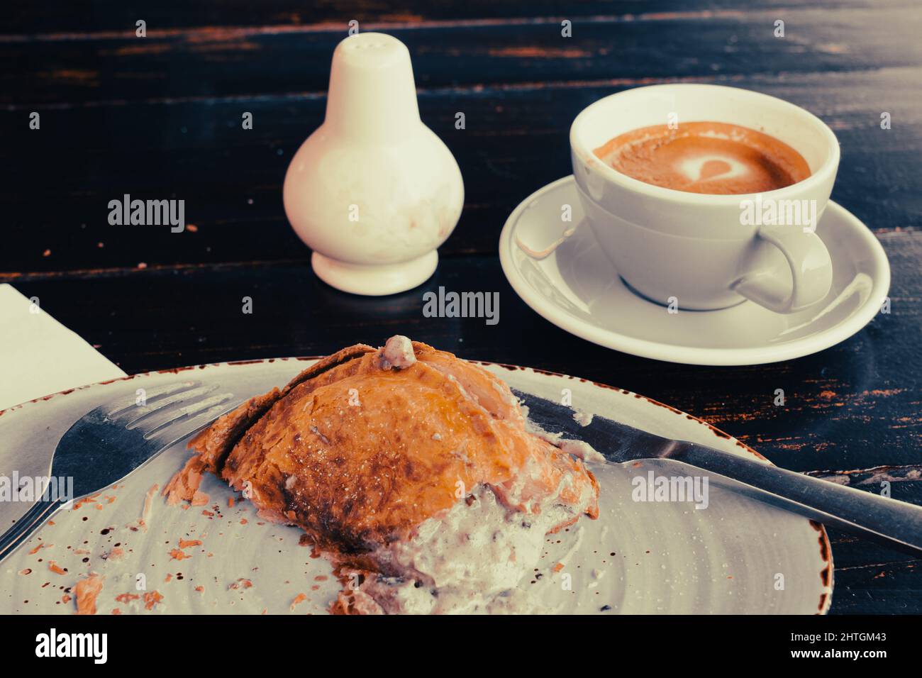 Old-fashioned cinematic style image pie and coffee retro style crockery ...