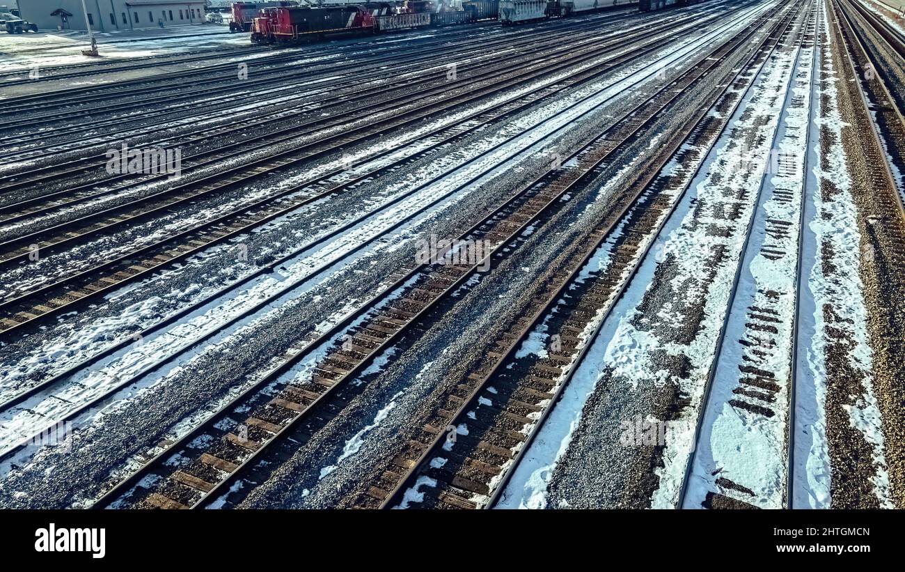 Empty railyard in winter that has snow on the ground Stock Photo - Alamy