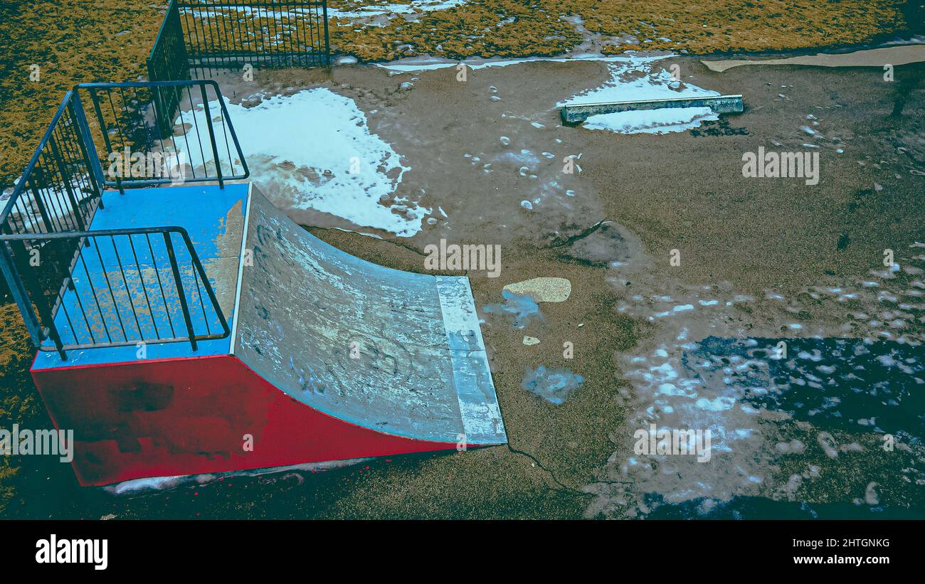 Snow and ice on the ground of public skatepark Stock Photo - Alamy