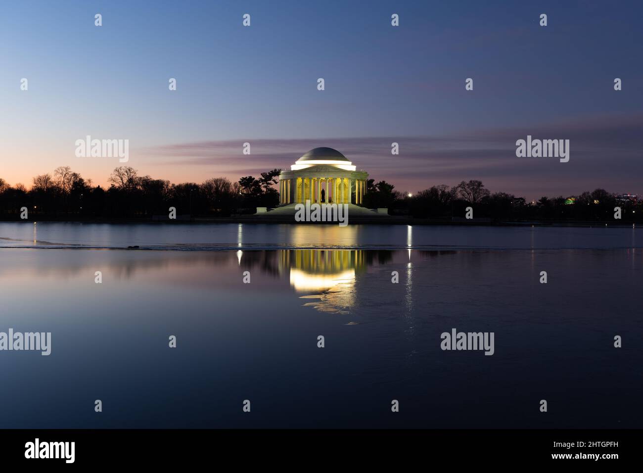The Jefferson Memorial at the Tidal Basin in Washington, DC at sunrise ...