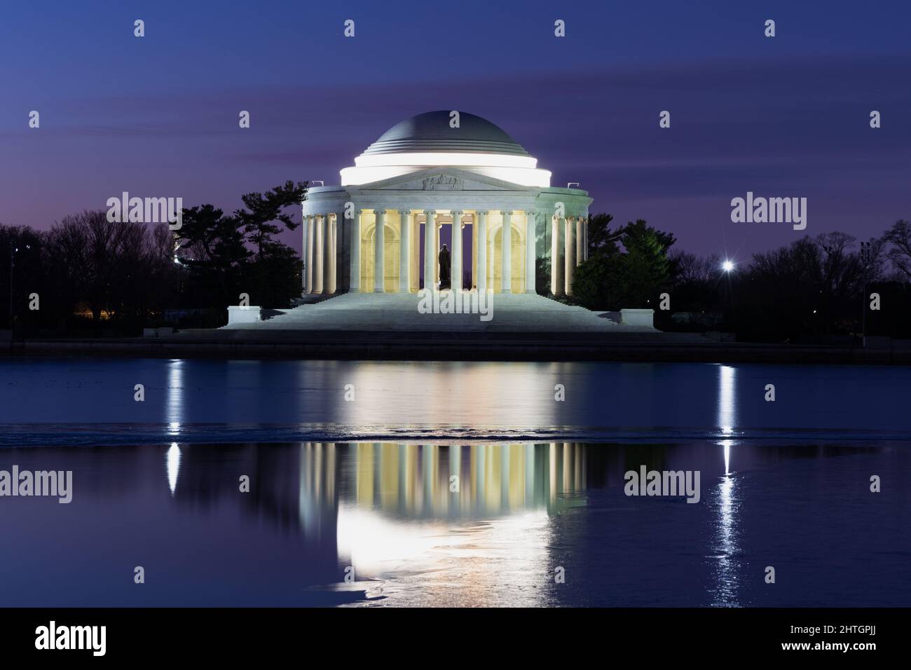 The Jefferson Memorial at the Tidal Basin in Washington, DC at sunrise ...