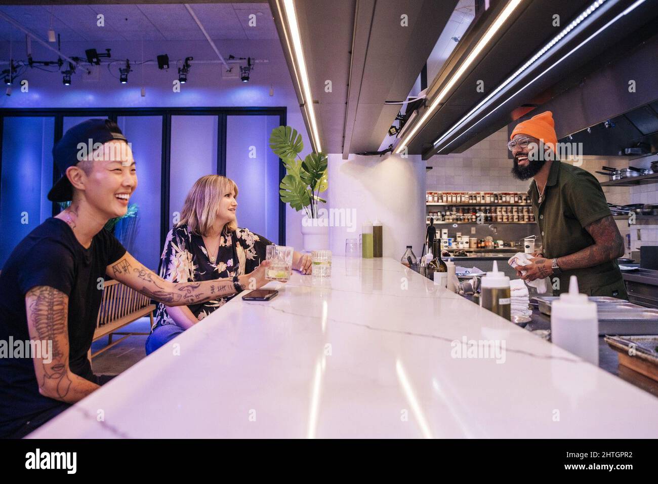 FAST FOODIES, from left: chef Kristen Kish, Jillian Bell, chef Justin ...