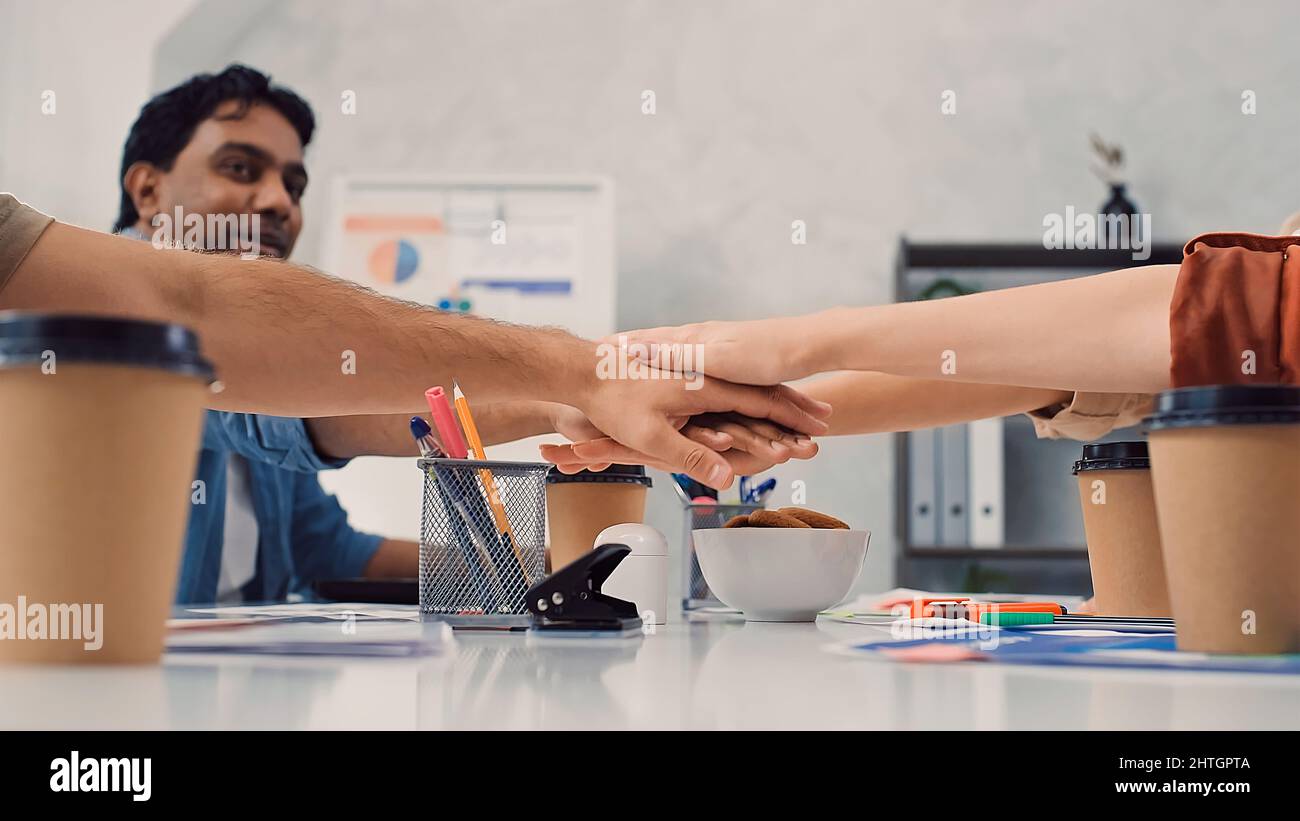 Creative Team Puts hands Together. Team Event. Hands Shake in Office ...