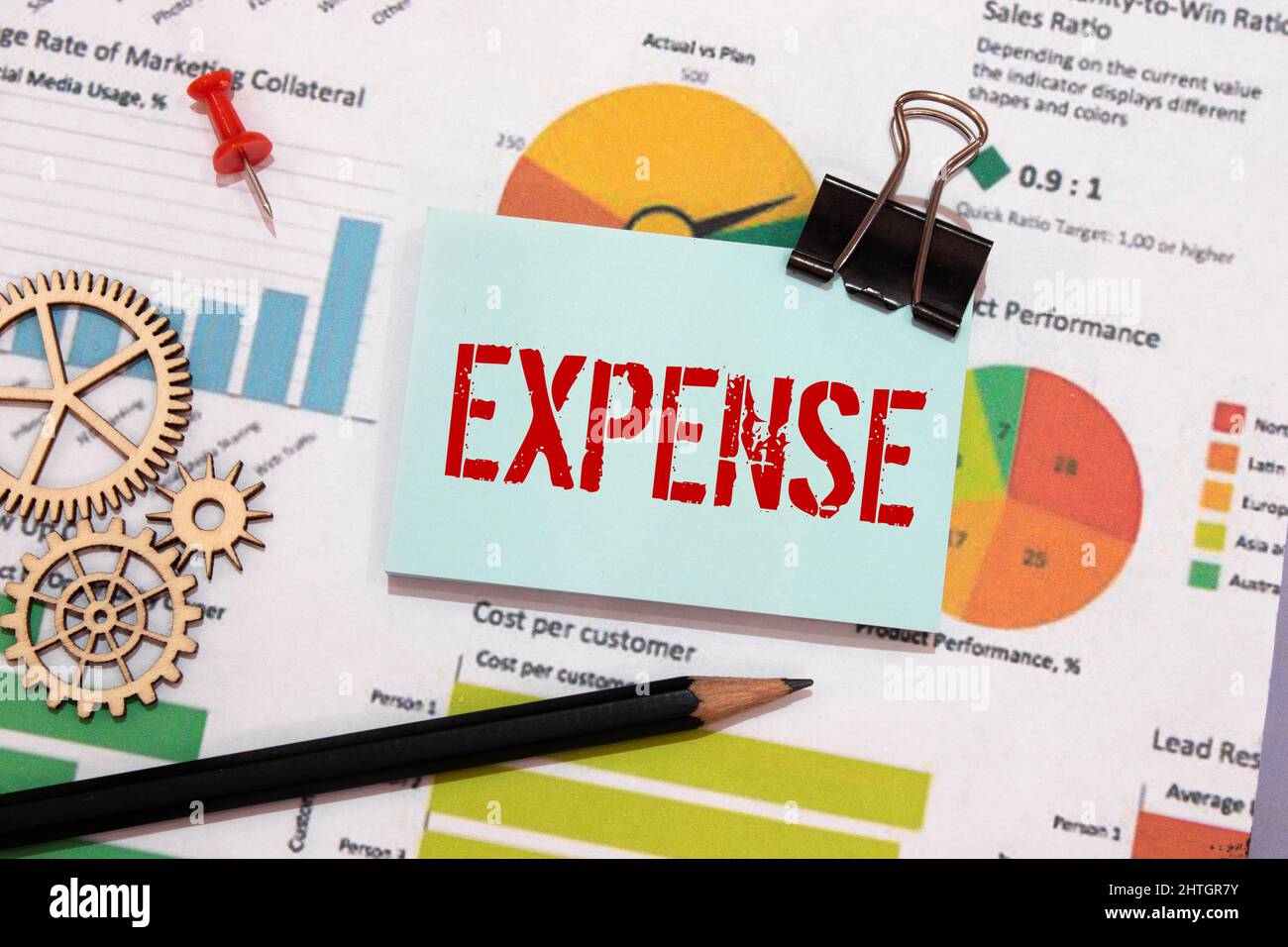 Notebook with the words Expenses. Outflow of money as payment for goods ...