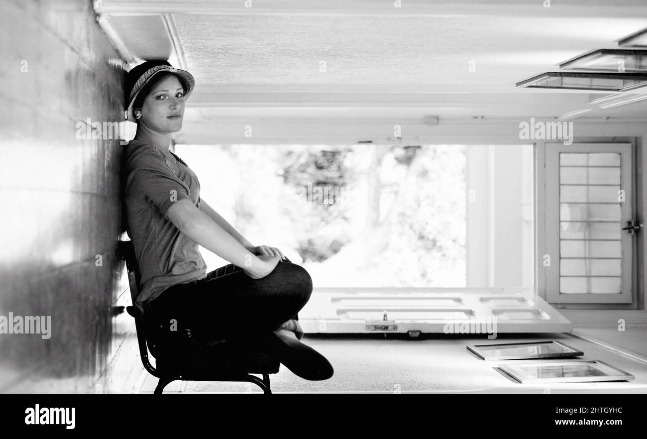 Person sitting down on a chair hi-res stock photography and images - Alamy