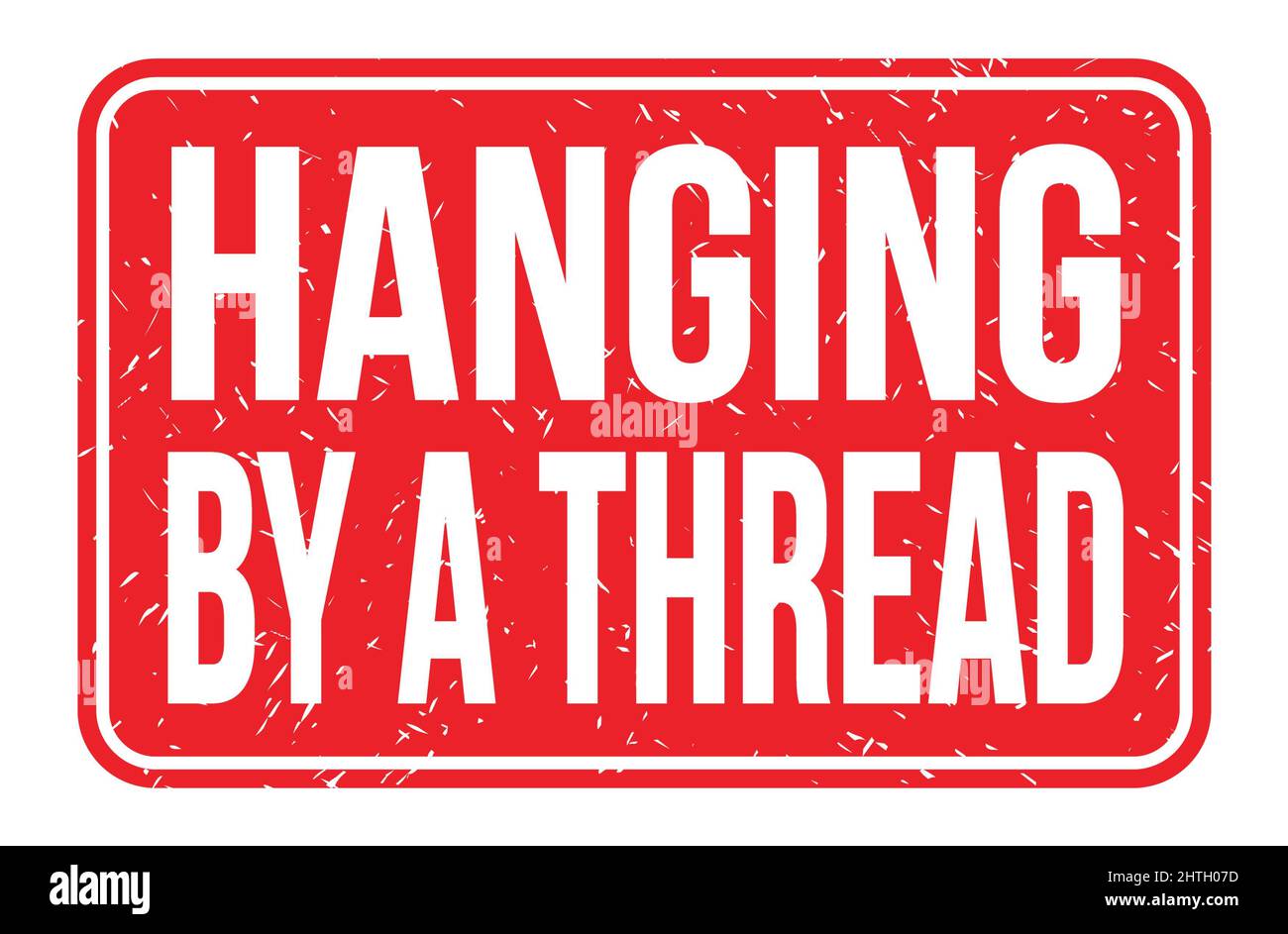 HANGING BY A THREAD, words written on red rectangle stamp sign Stock ...