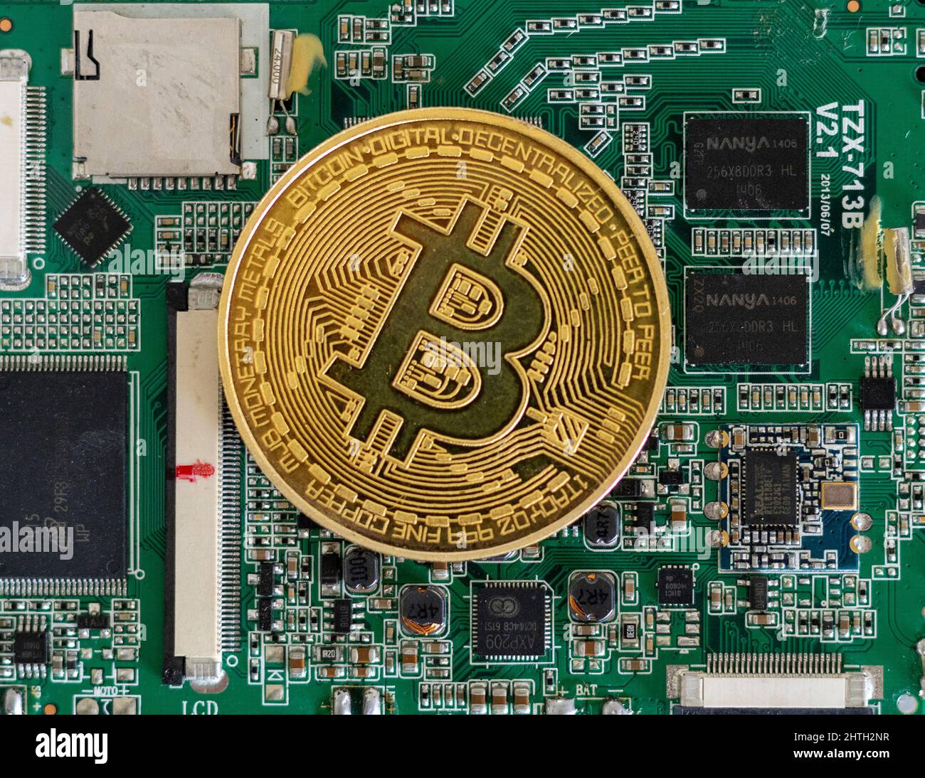Bitcoin on a circuit board crypto currencies mining concepts Stock ...