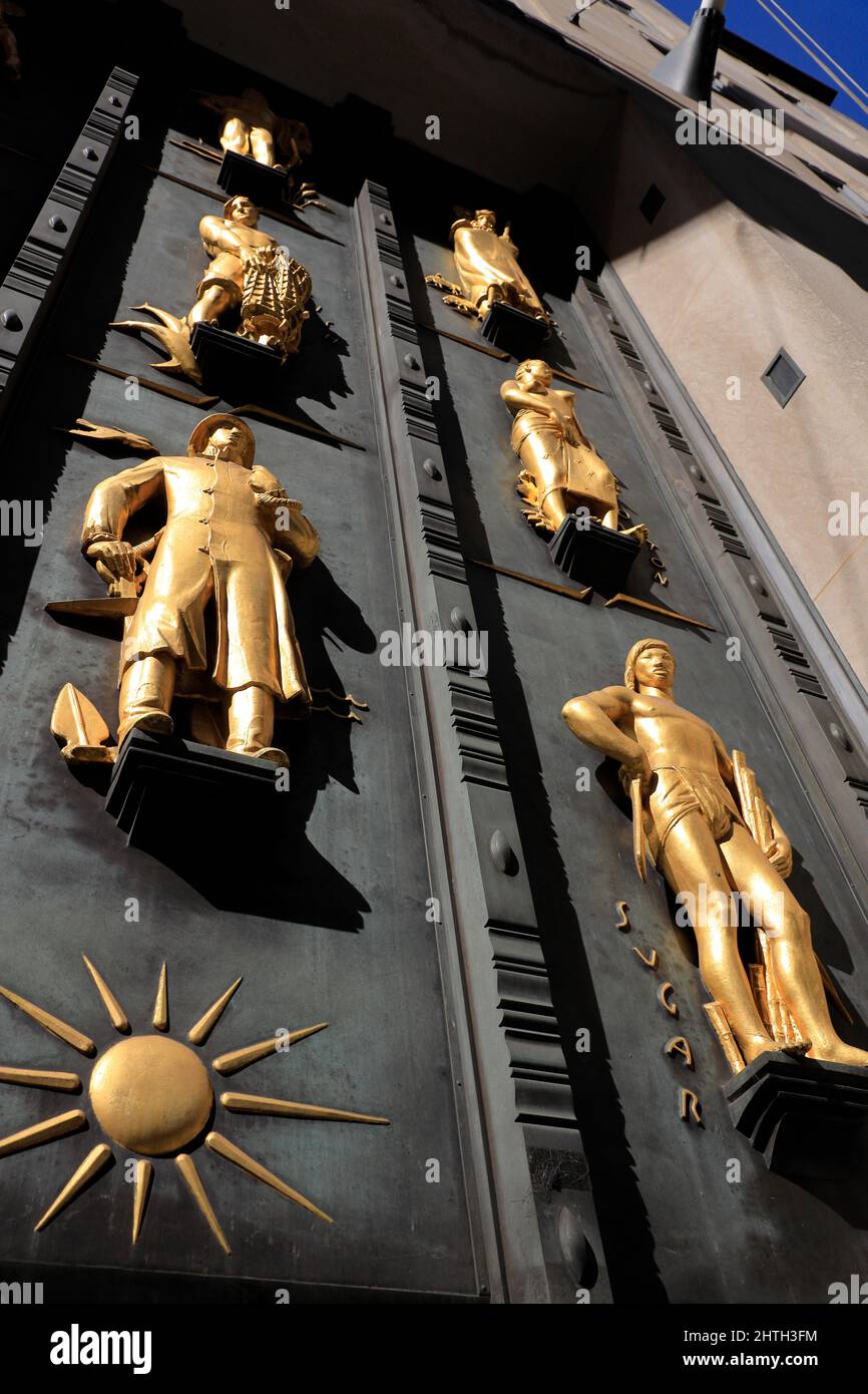 Golden statues depicting trades decorated the door on 30 Rockefeller ...