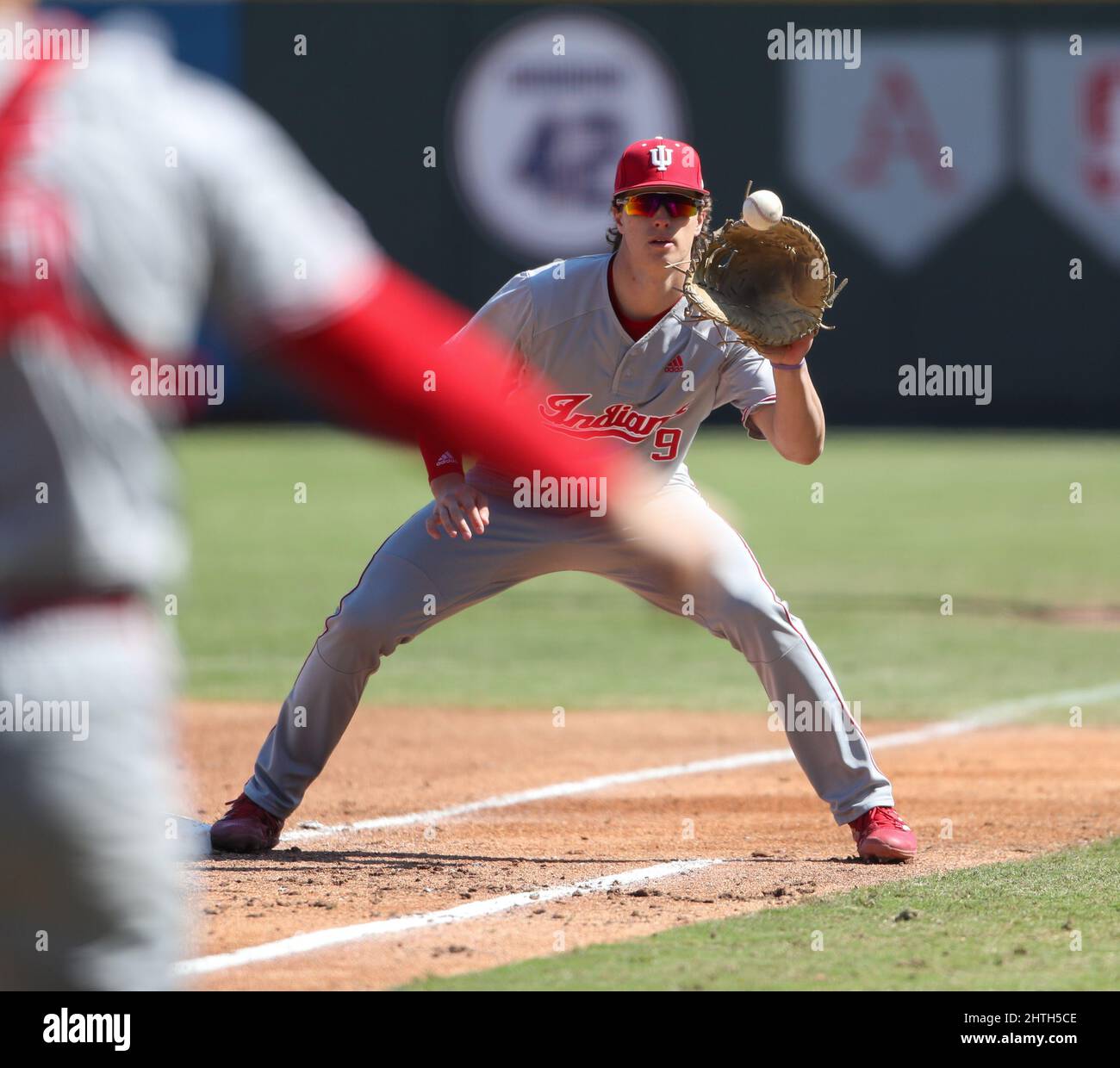 February 27, 2022: Indiana first baseman Brock Tibbitts (9) catches a ...