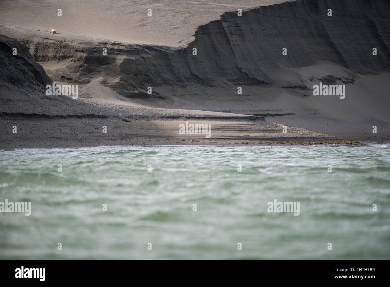 Erosion of a sandy beach and sand bar Stock Photo - Alamy