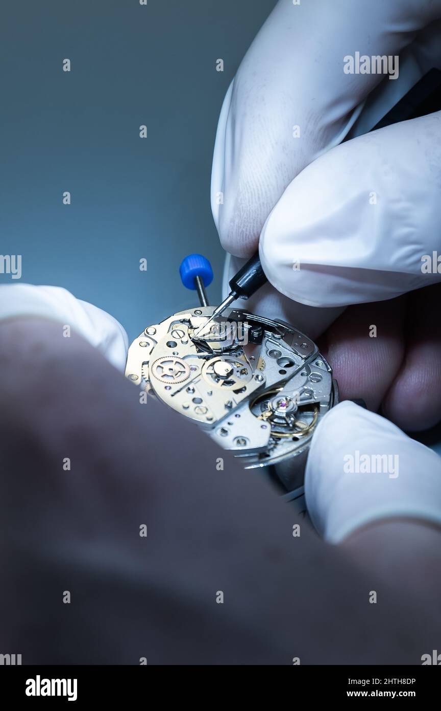Schramberg, Germany. 18th Feb, 2022. An employee of the watch ...