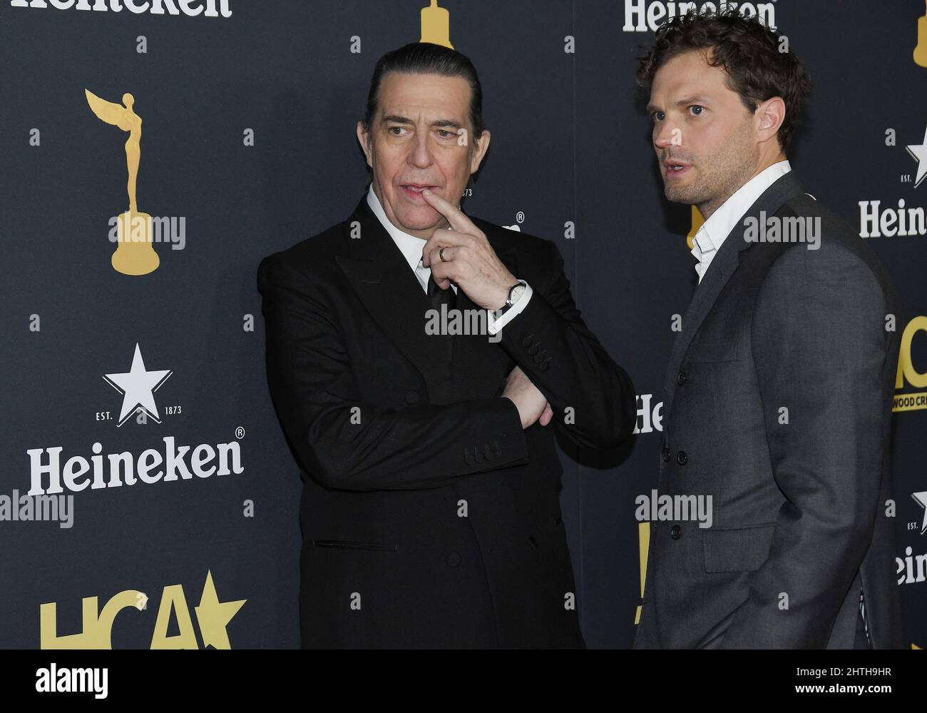 Los Angeles, USA. 28th Feb, 2022. (L-R) Ciarán Hinds and Jamie Dornan ...