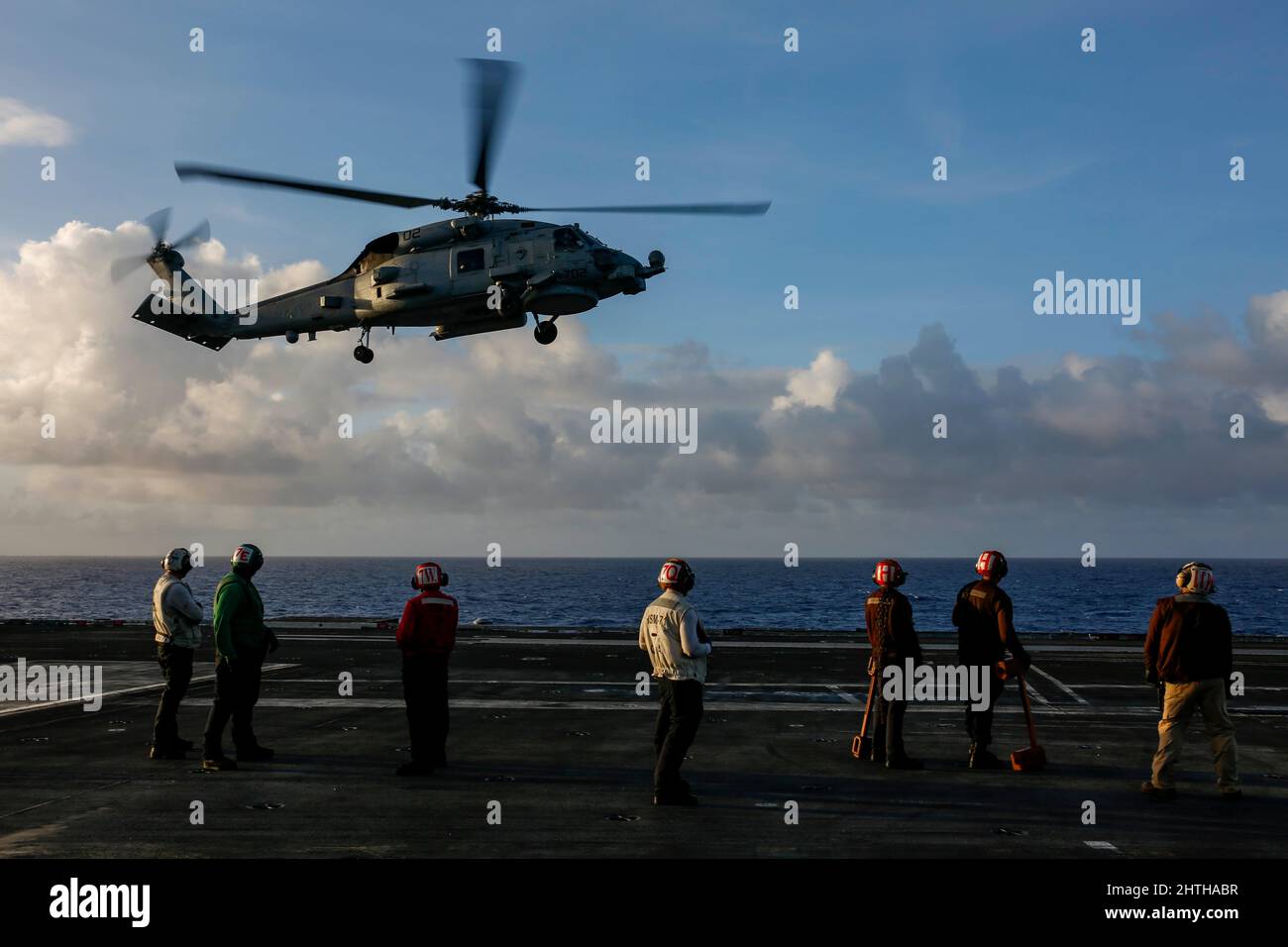 PHILIPPINE SEA (Feb. 28, 2022) An MH-60R Sea Hawk helicopter, assigned ...