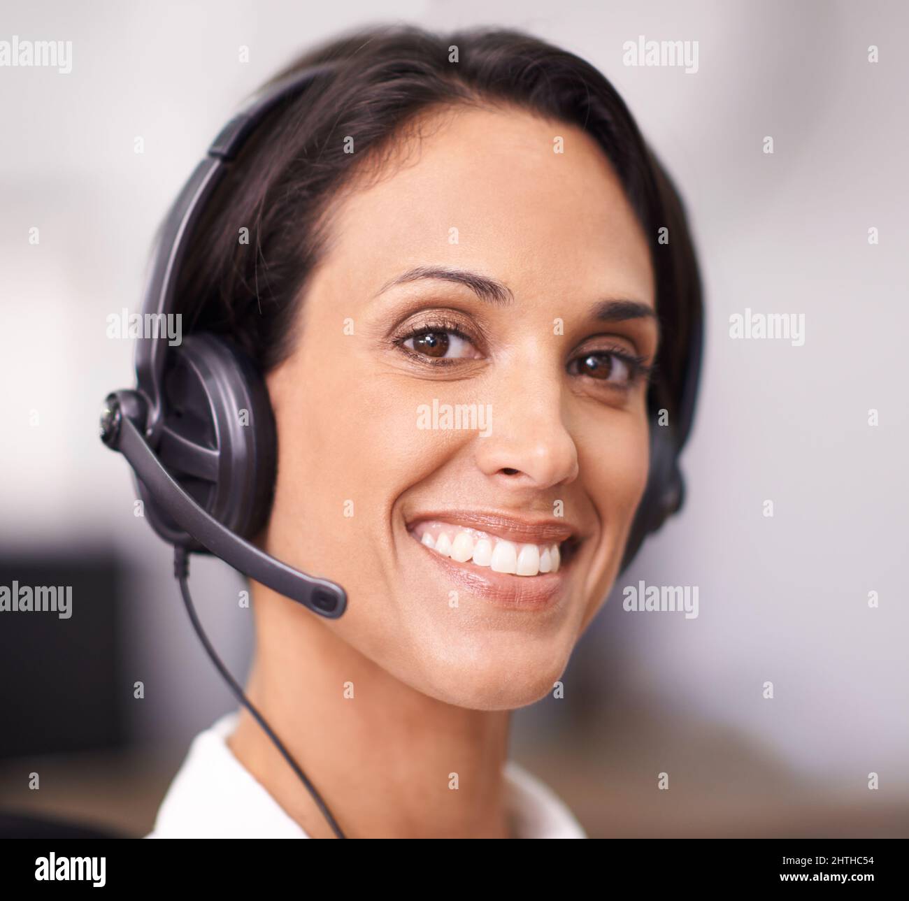 Ready to solve your problem. Portrait of an attractive young office ...