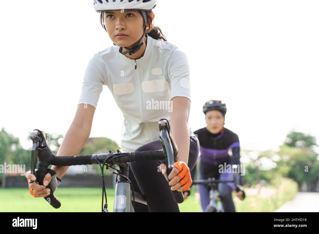 Asian teen ride bike helmet hi-res stock photography and images - Alamy