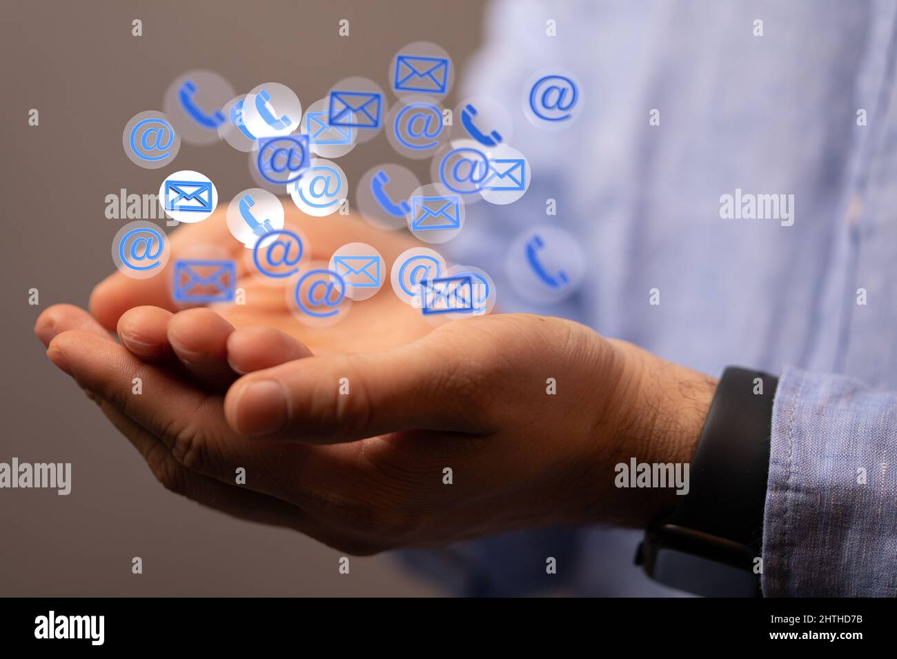 3D rendering of floating mail and call icons above hands Stock Photo ...