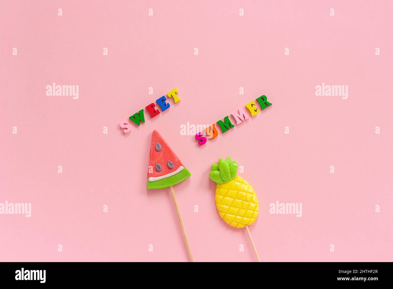 Sweet summer text, Pineapple and watermelon lollipops on pink ...