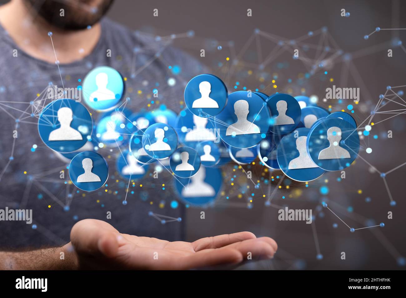 Man holding blue person icons - networking, digital technology and ...