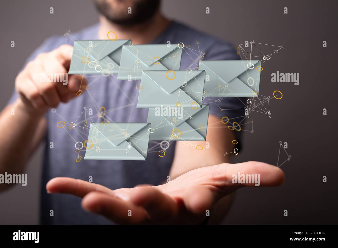 Close-up of email icons hovering over a hand - Email communication ...