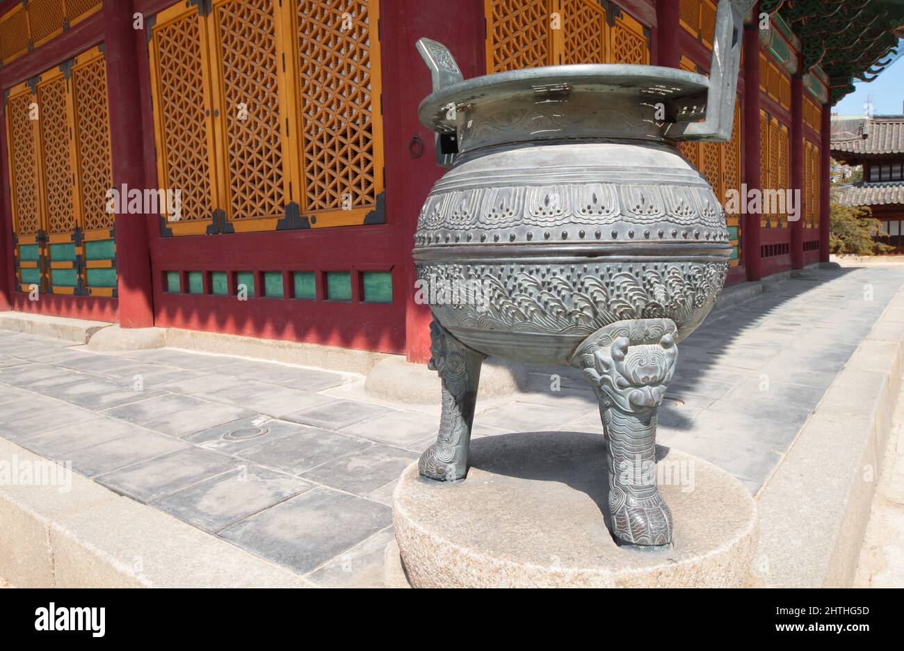 Ancient bronze incense furnace outside a classic korean building Stock ...