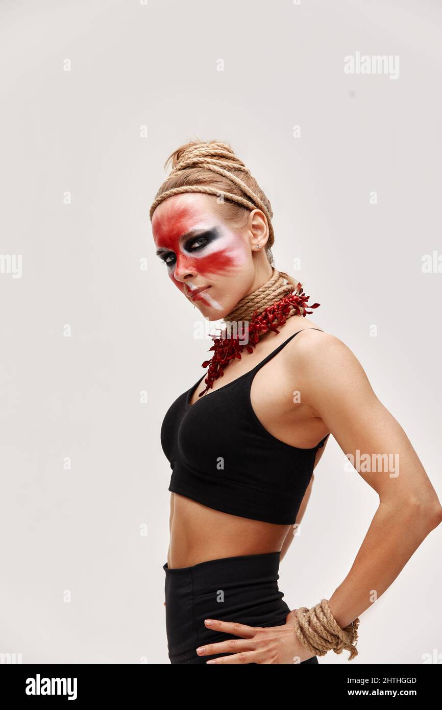 close up portrait of young beautiful girl with colorful face painting ...