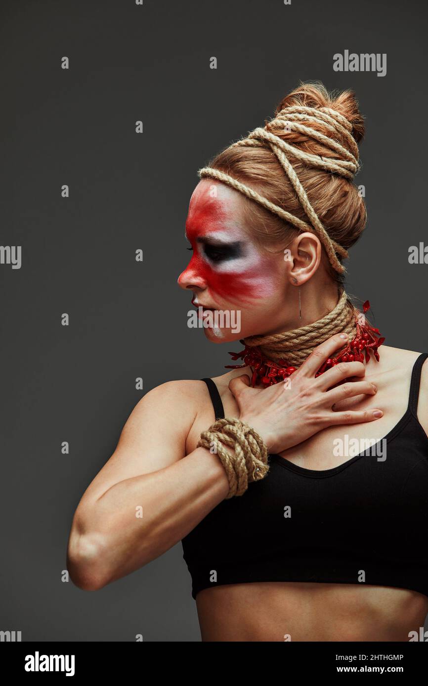 close up portrait of young beautiful girl with colorful face painting ...