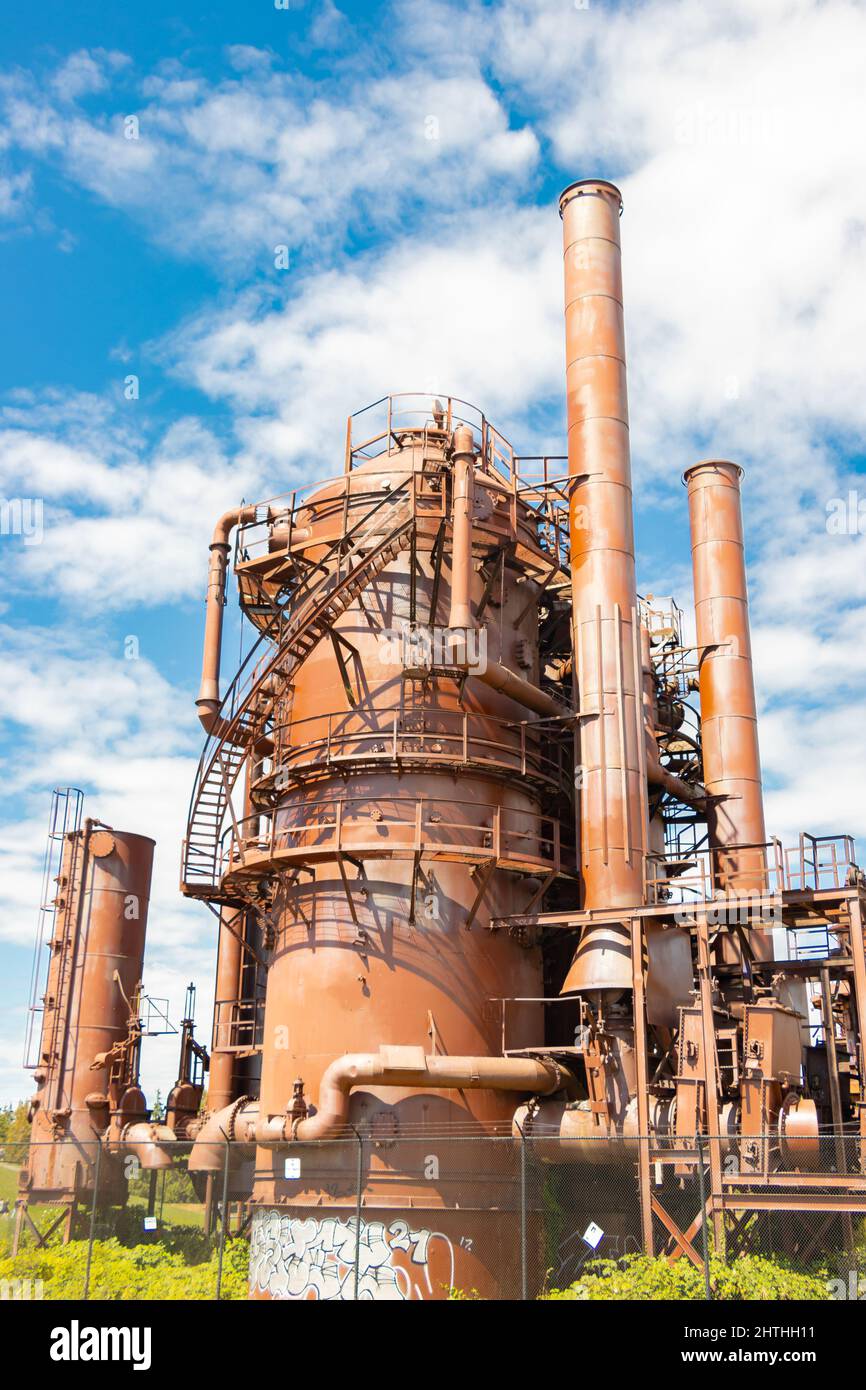 rusty gasification plant against blue sky at gas works park in Seattle ...