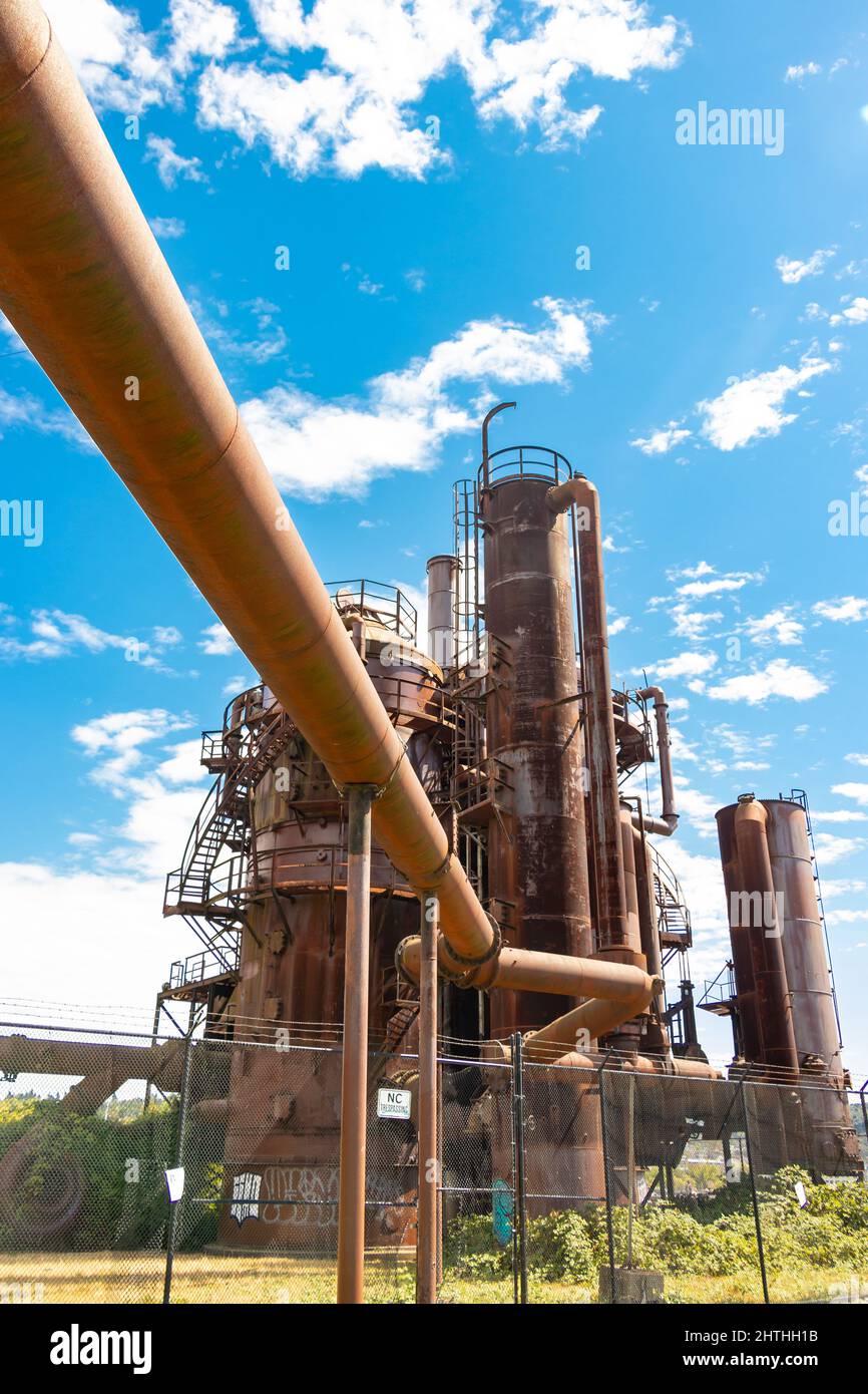 rusty gasification plant against blue sky at gas works park in Seattle ...