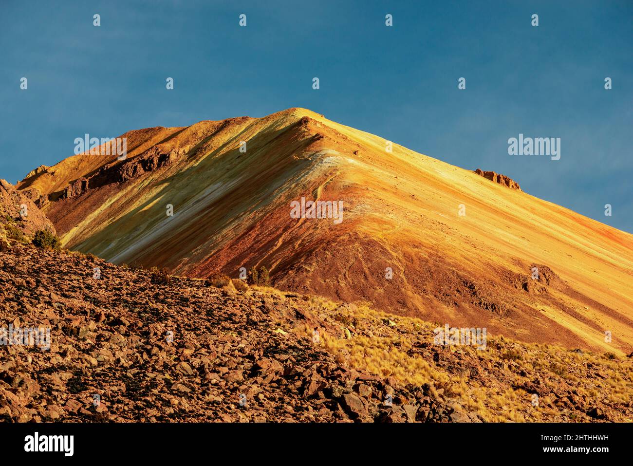 colorful ridge of Tunupa volcano by sunny morning in Bolivia Stock ...