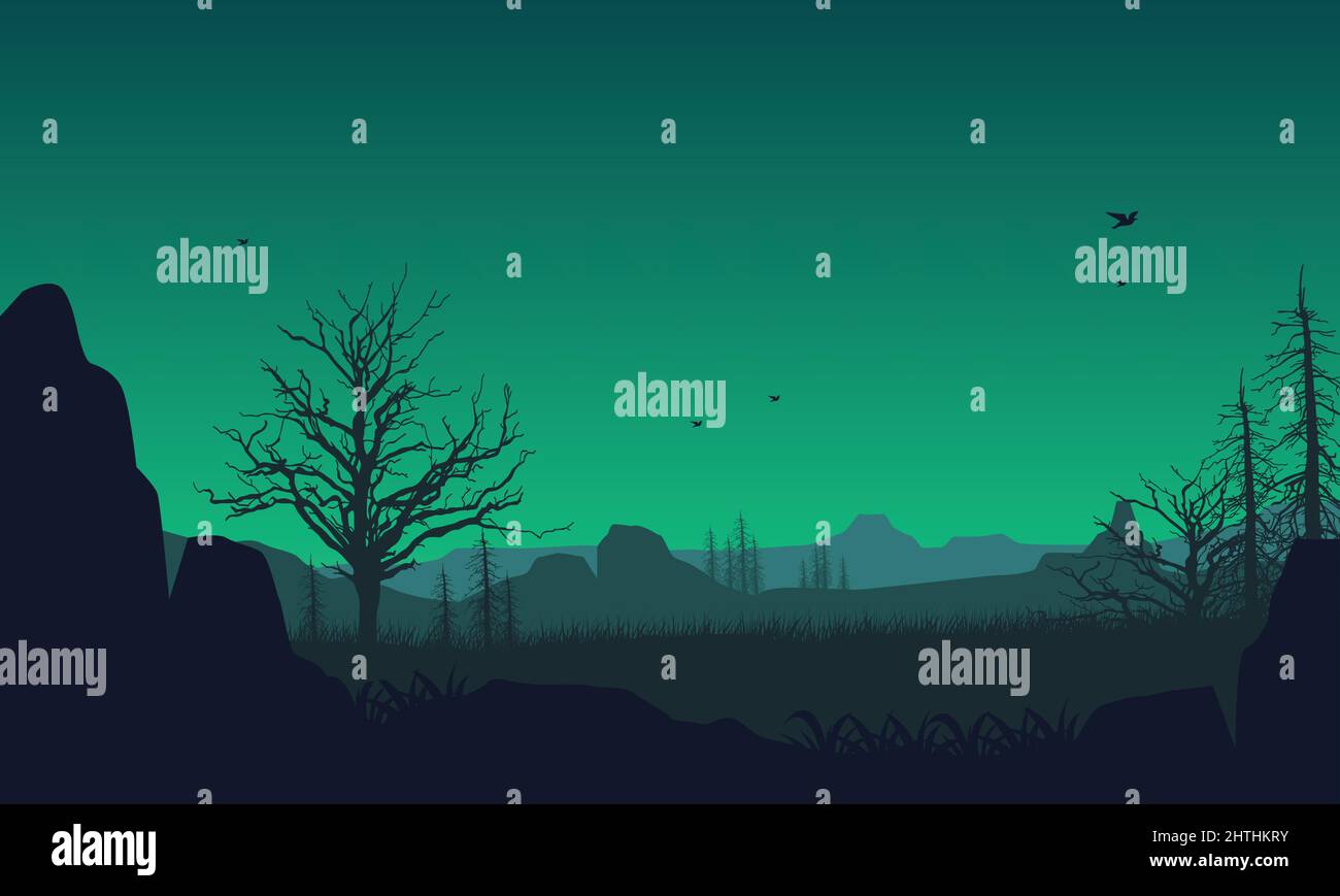 Mountain view with fantastic dry tree silhouette from the cliff edge ...