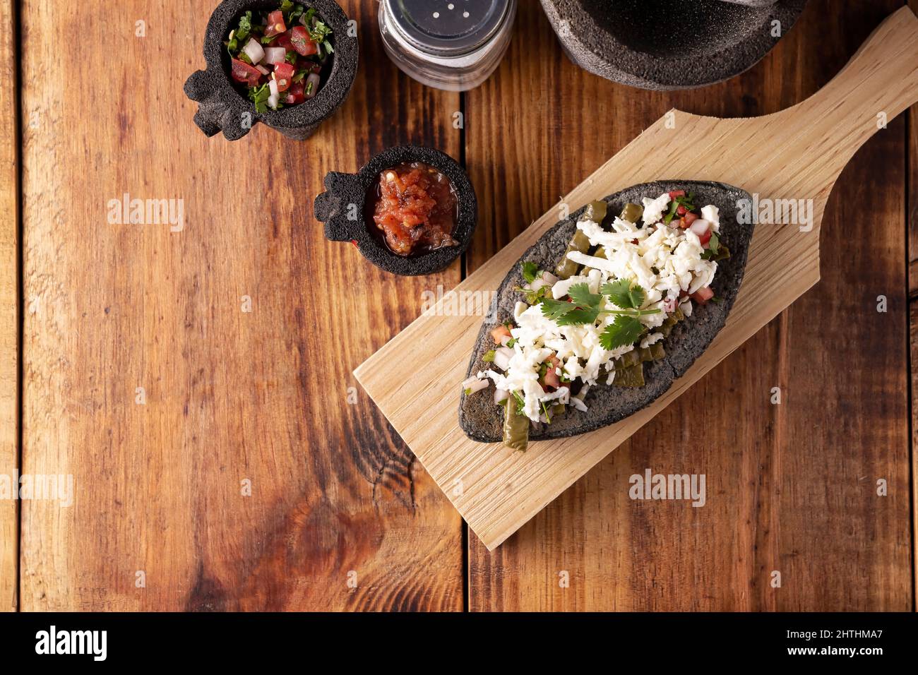 Tlacoyo with Nopales and Cheese. Mexican pre hispanic dish made of blue ...