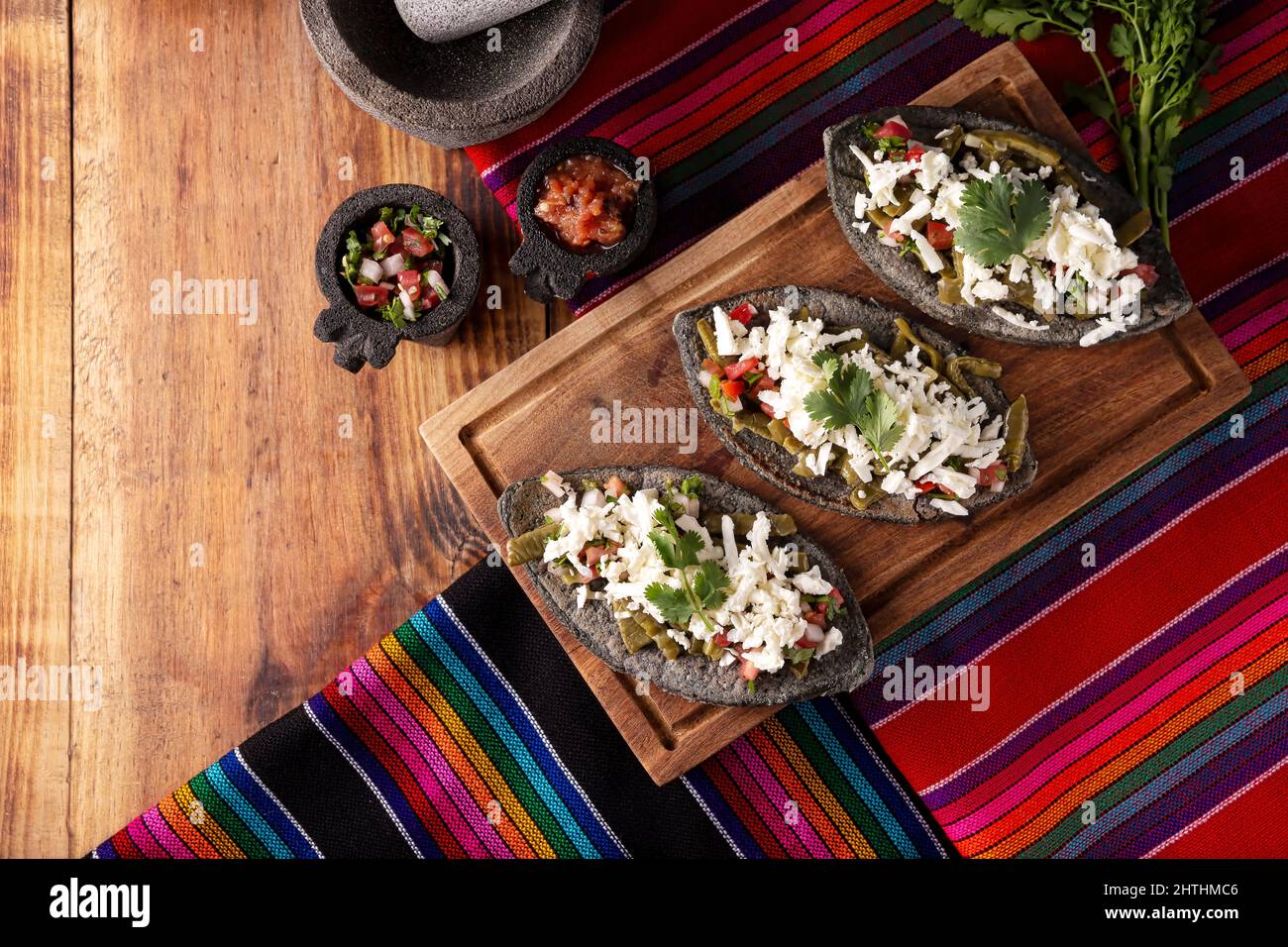 Tlacoyos. Mexican pre hispanic dish made of blue corn flour patty ...