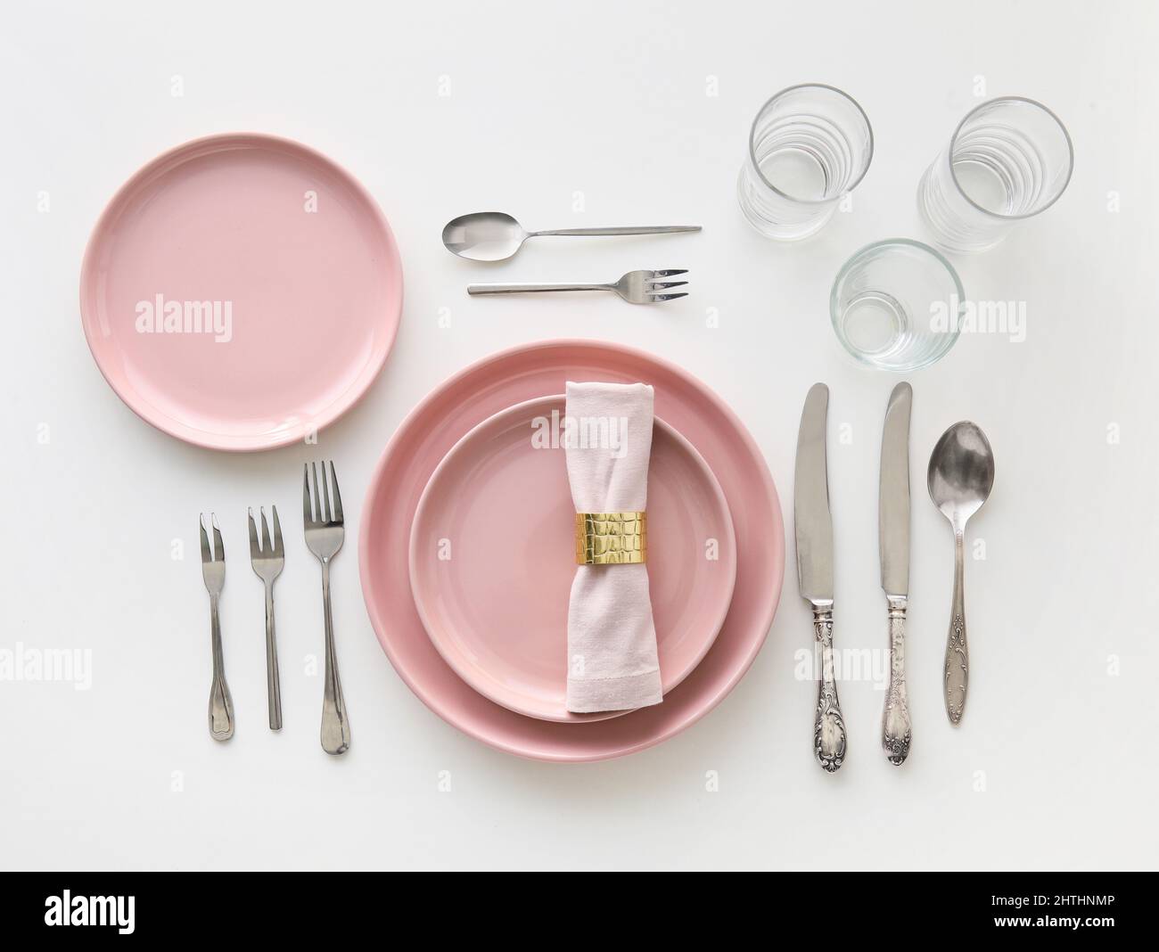 Elegant table setting on white background Stock Photo - Alamy