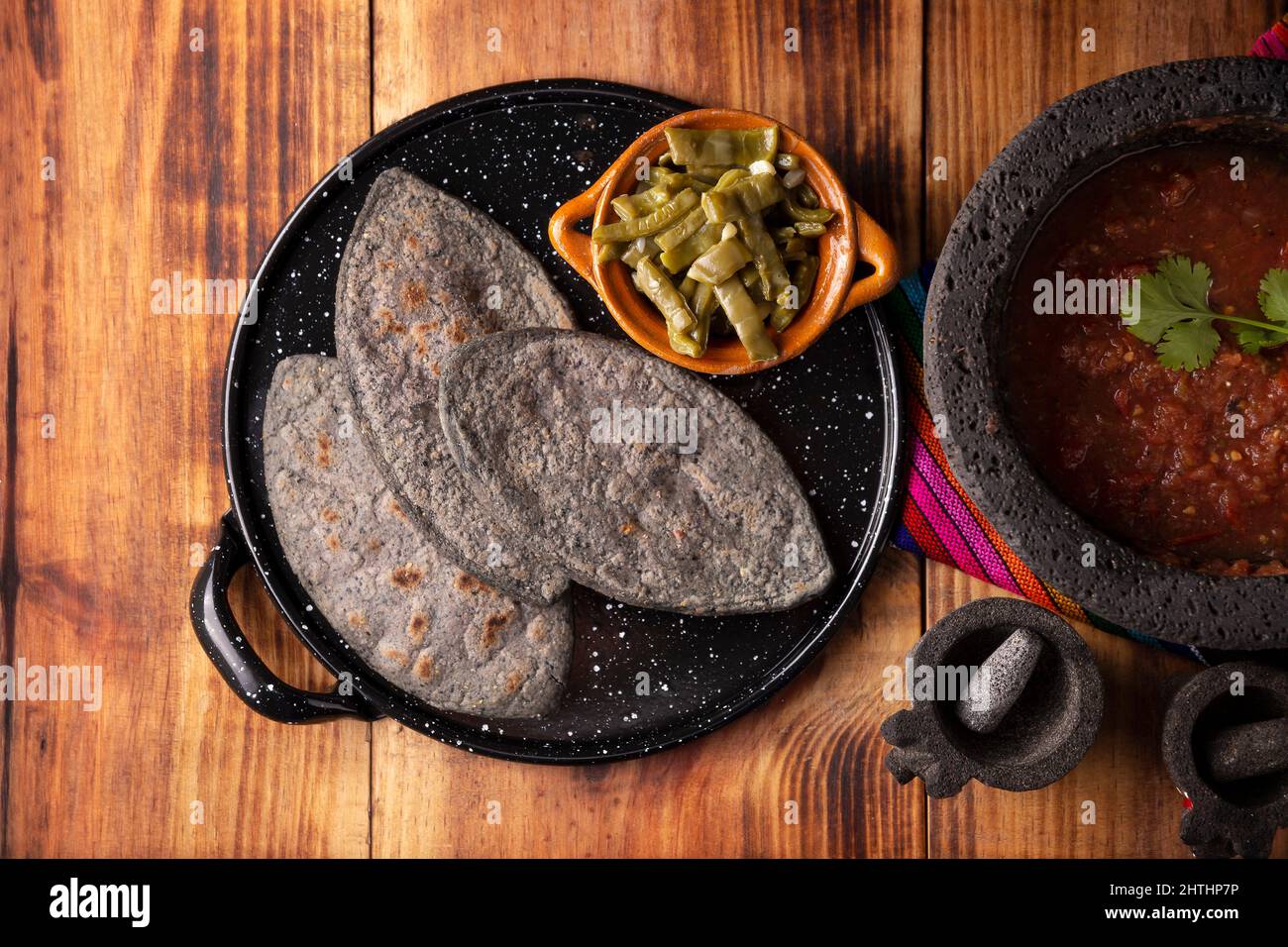 Tlacoyos. Mexican pre hispanic dish made of blue corn flour patty ...