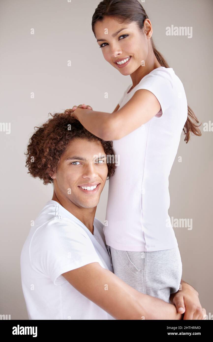 Shes the one for me. Studio portrait of a beautiful young couple ...