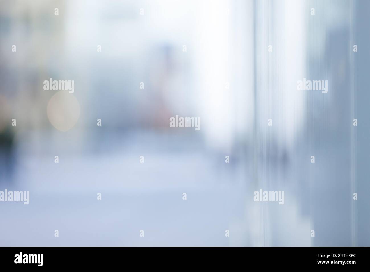 Blurred background of modern office exterior with sunlight beaming ...