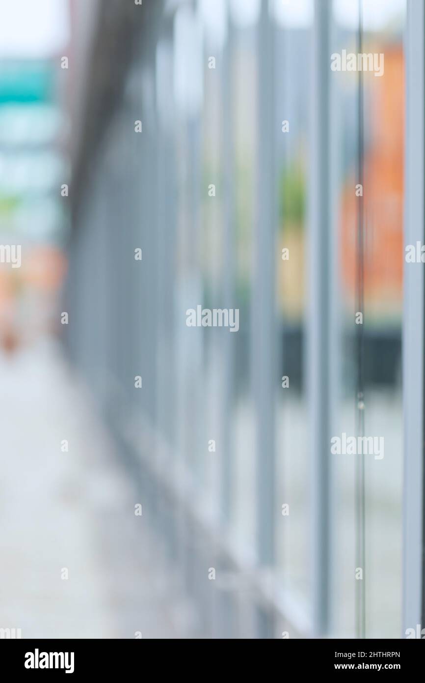 Vertical of blurred background of modern office exterior with sunlight ...