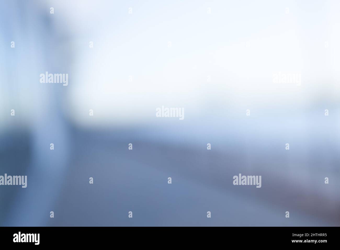 Blurred background of modern office exterior with sunlight beaming ...