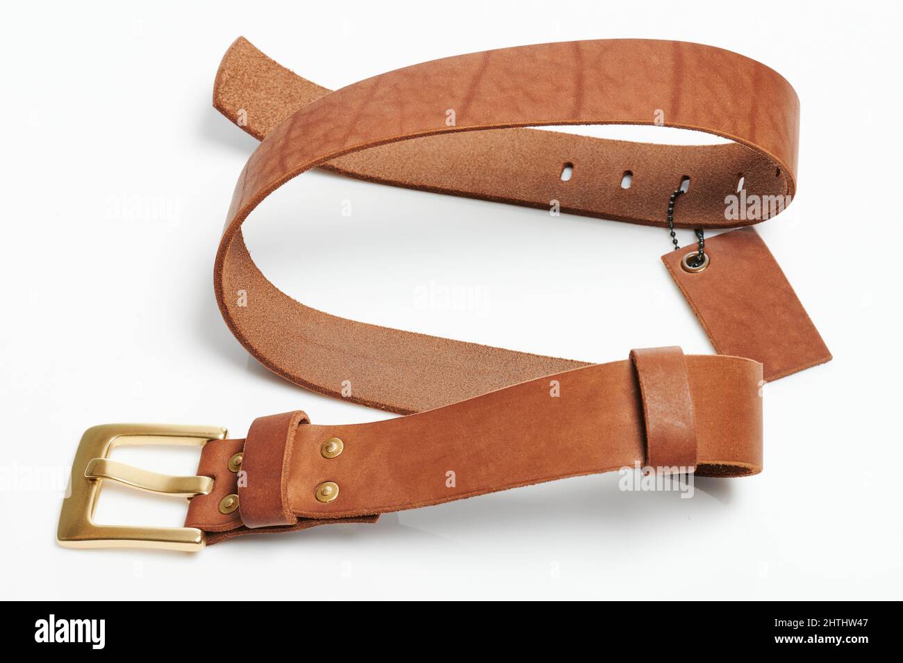 Brown color leather natural belt with retail tag isolated Stock Photo ...
