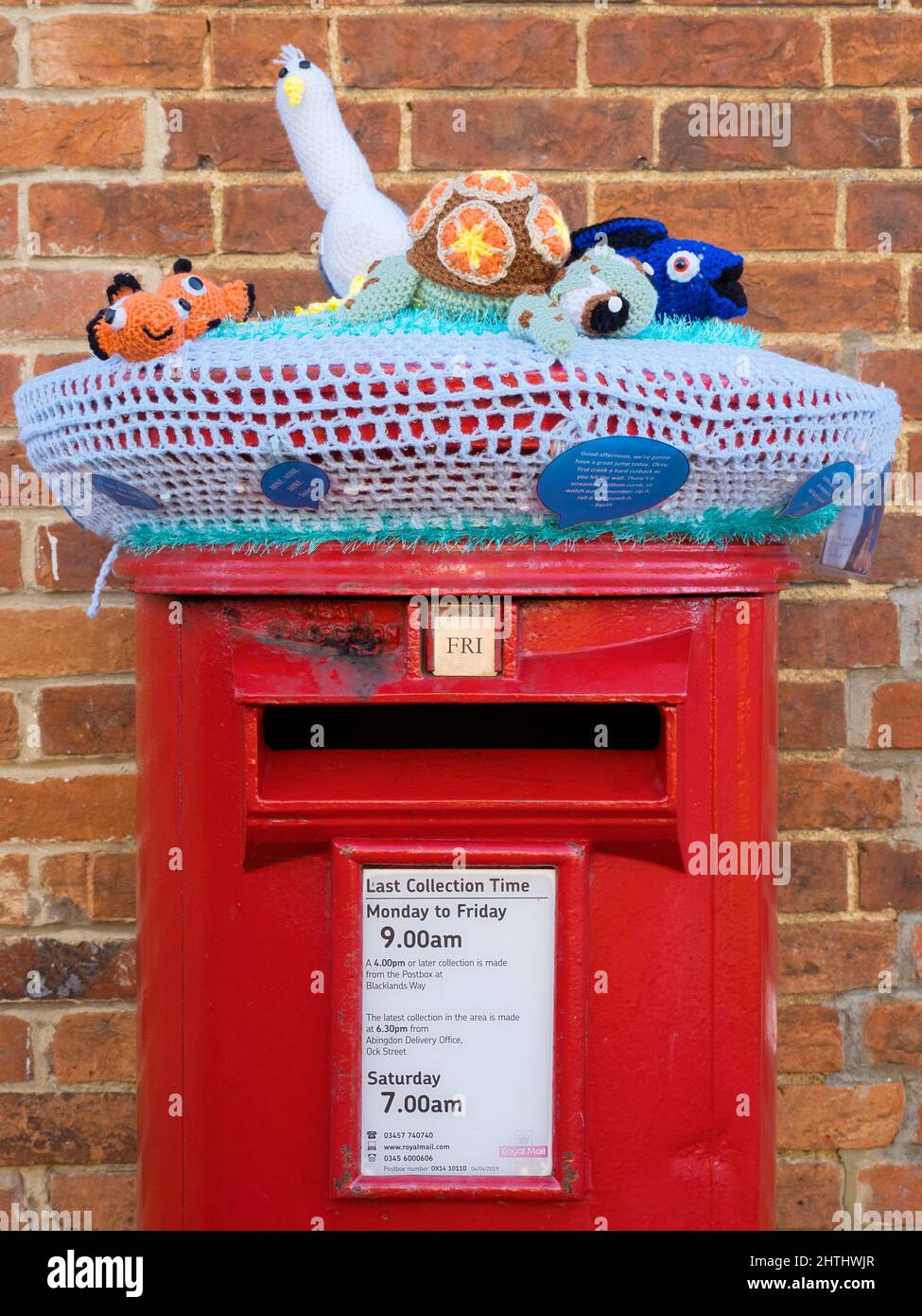 Knitted cover for post box hi-res stock photography and images - Alamy
