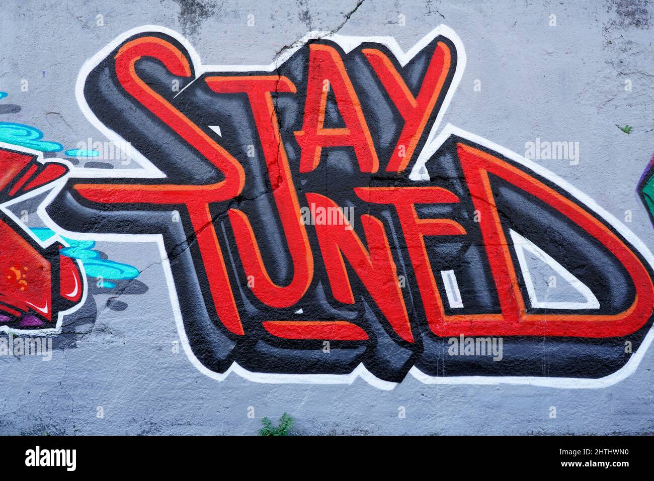 Graffiti street art on the walls of the railway in Lambrate district ...