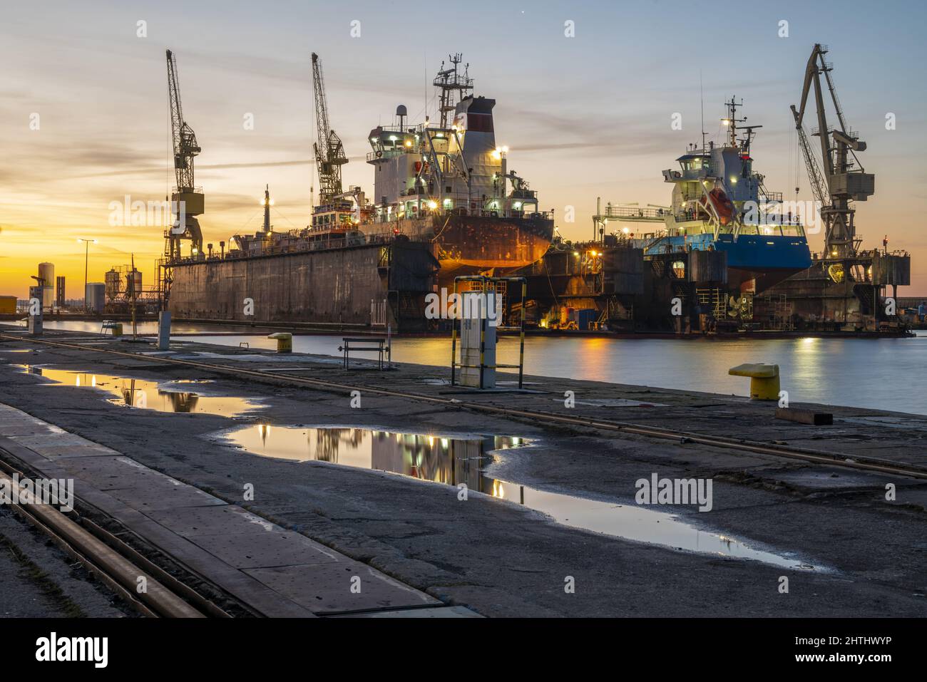 Commercial vessels overhauled at a ship repair yard Stock Photo - Alamy