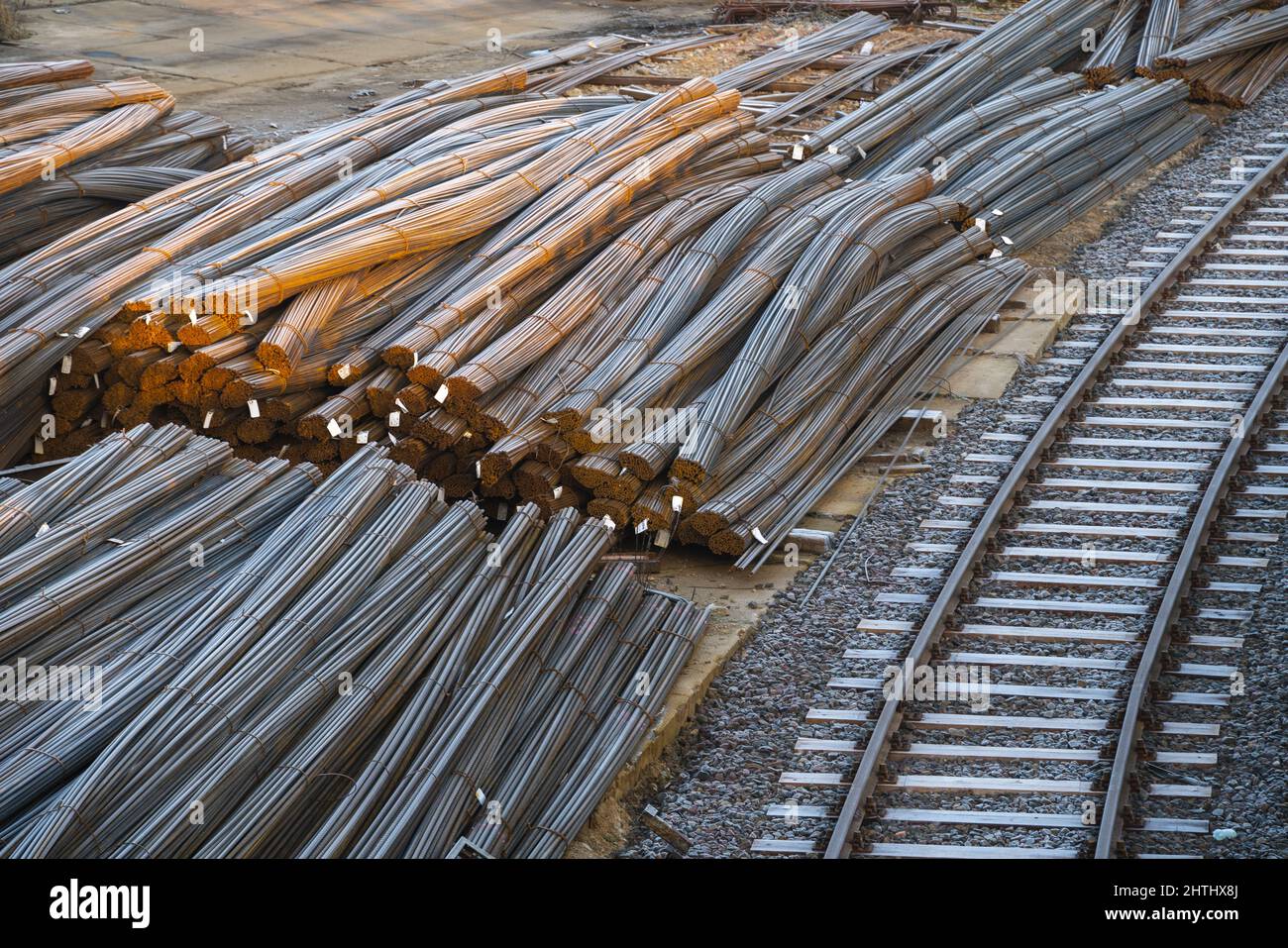 Bundles of reinforcing steel lying by the railroad tracks Stock Photo ...